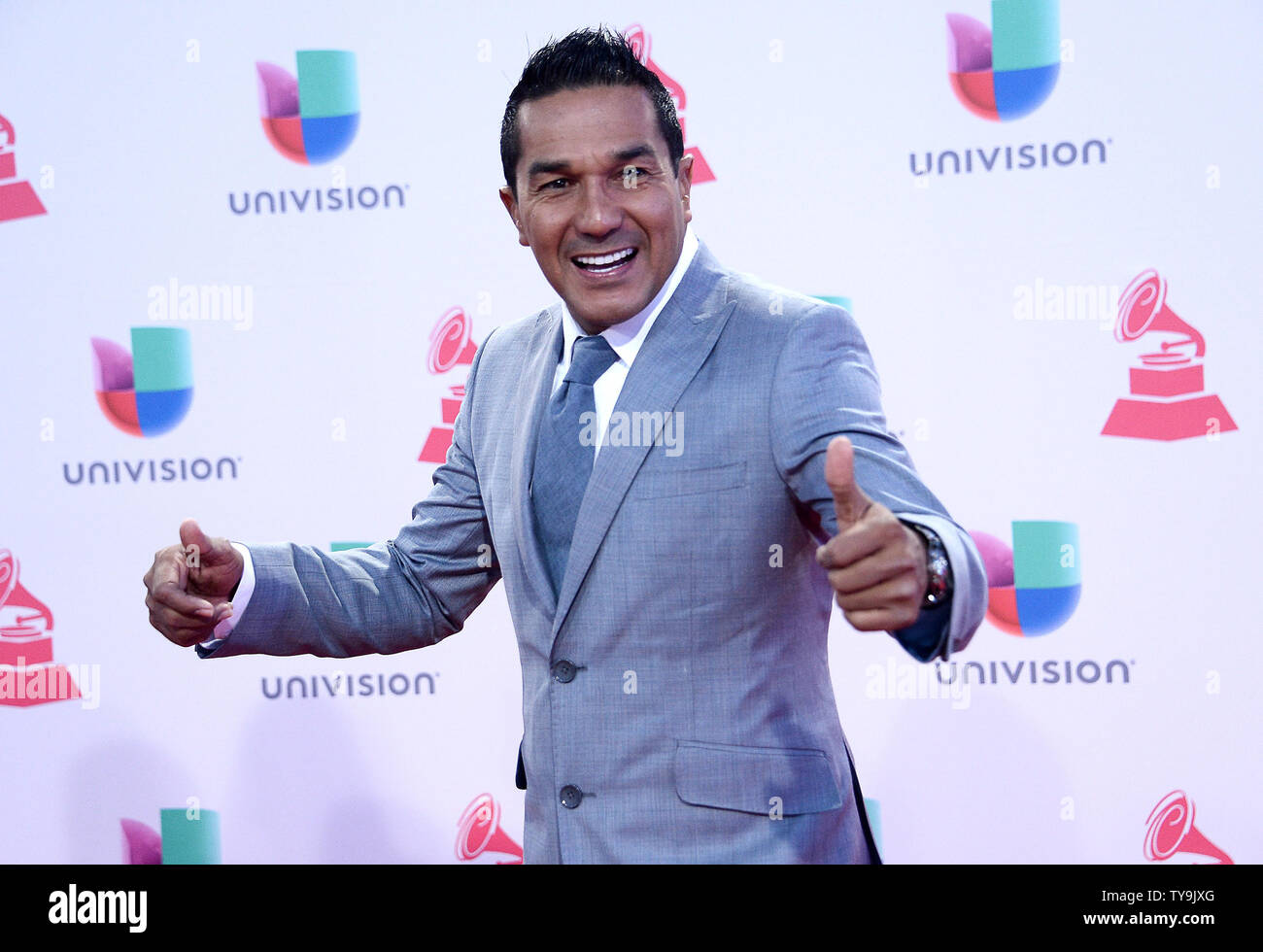 Checo Acosta arrives for the 16th Annual Latin Grammy Awards at the MGM ...