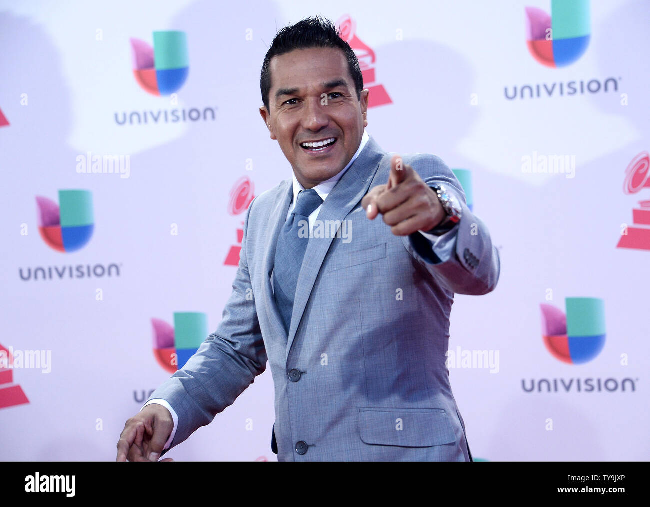 Checo Acosta arrives for the 16th Annual Latin Grammy Awards at the MGM ...