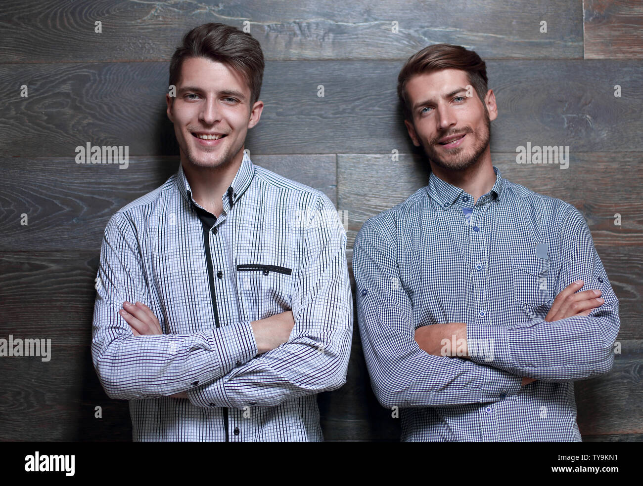 Two young mans isolated Stock Photo - Alamy