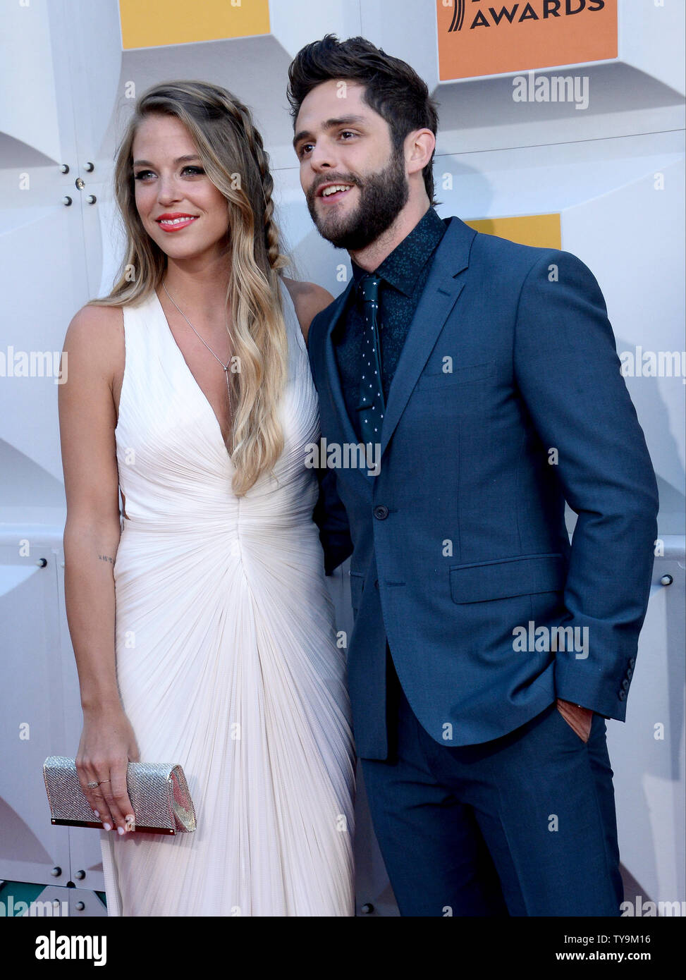 Singer Thomas Rhett (R) and Lauren Gregory attend the 51st annual ...