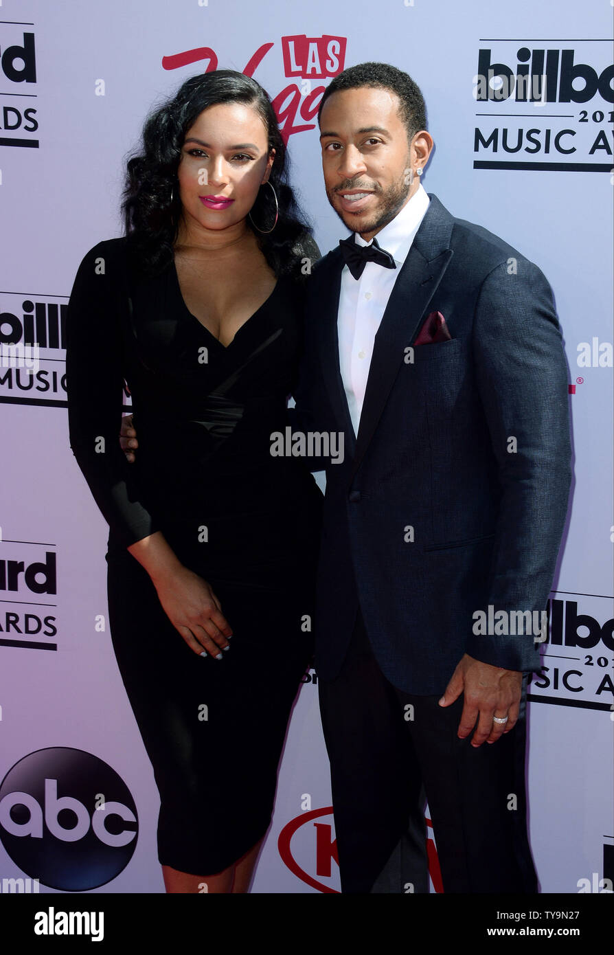 Host Ludacris (R) and Eudoxie Mbouguiengue attend the annual Billboard ...
