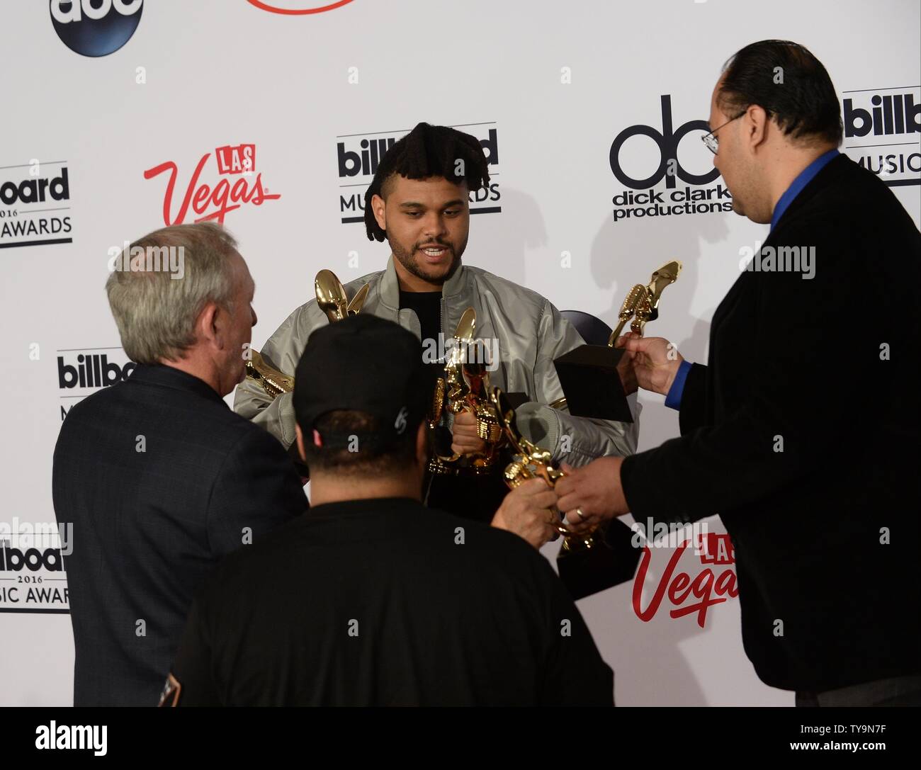 Singer The Weeknd appears backstage with his 8 Awards for Top Hot 100 ...