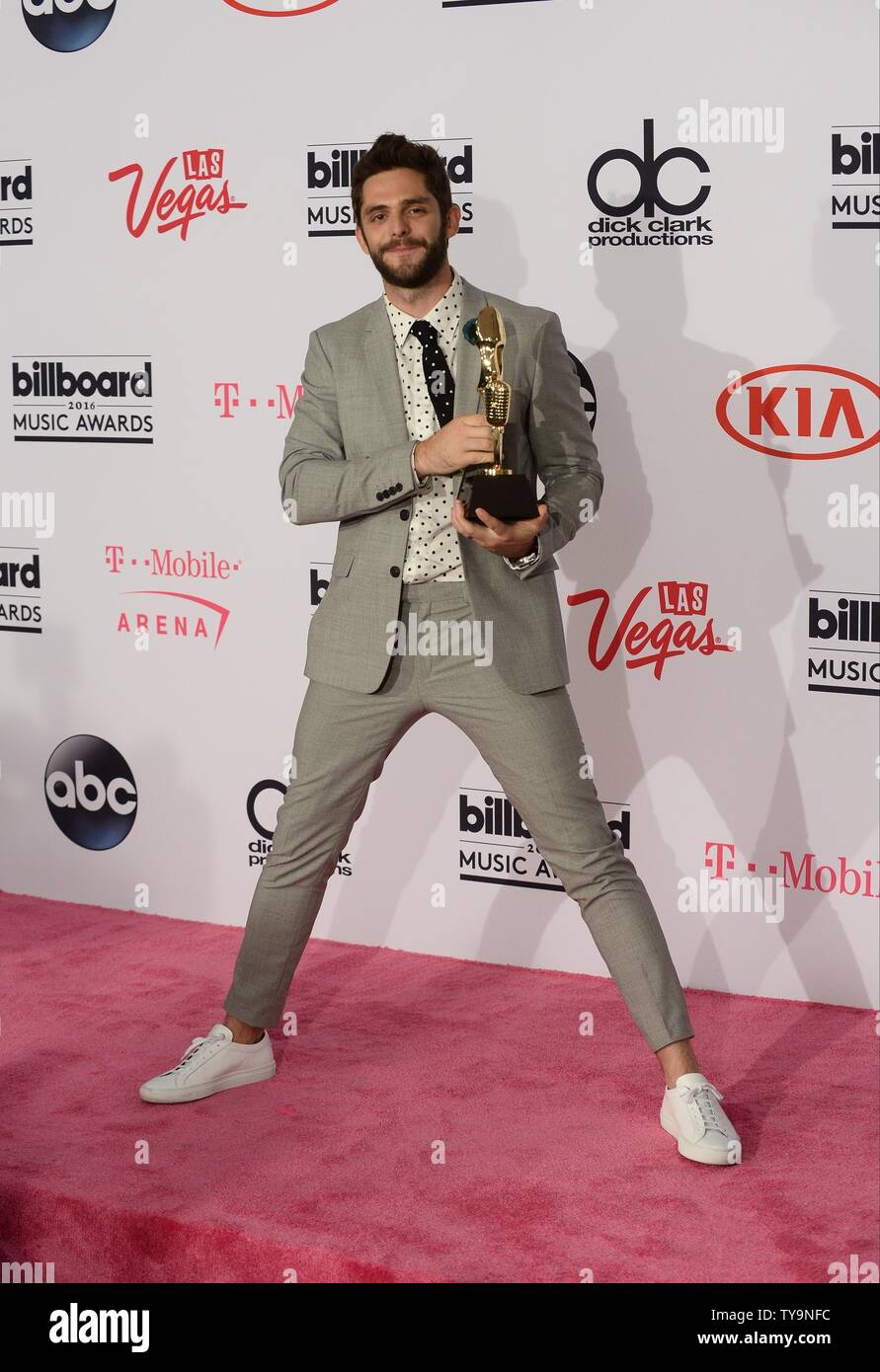 Musician Thomas Rhett appears backstage with the Top Country Song Award ...