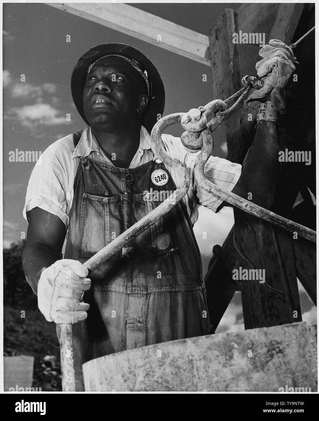 Negro bucket man at the Tennessee Valley Authority Douglas Dam on the ...