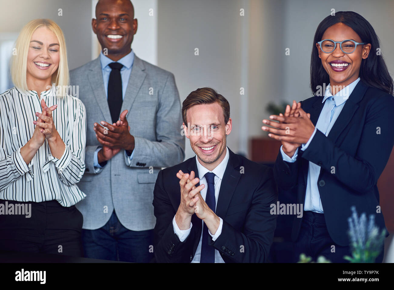 Diverse group of people clapping hi-res stock photography and images ...