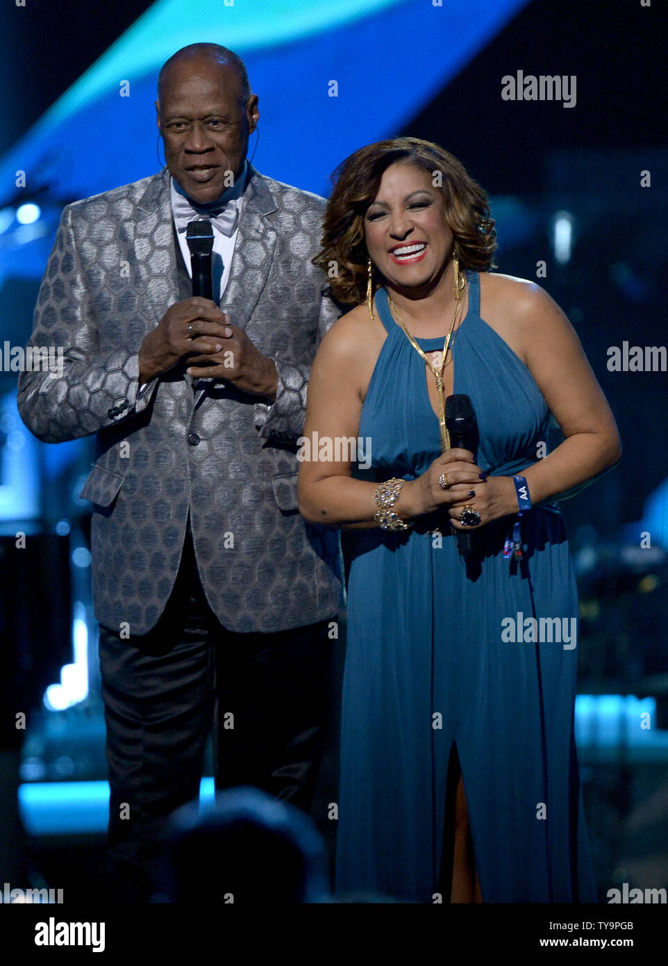 (L-R) Singers Johnny Ventura and Milly Quezada perform onstage during ...