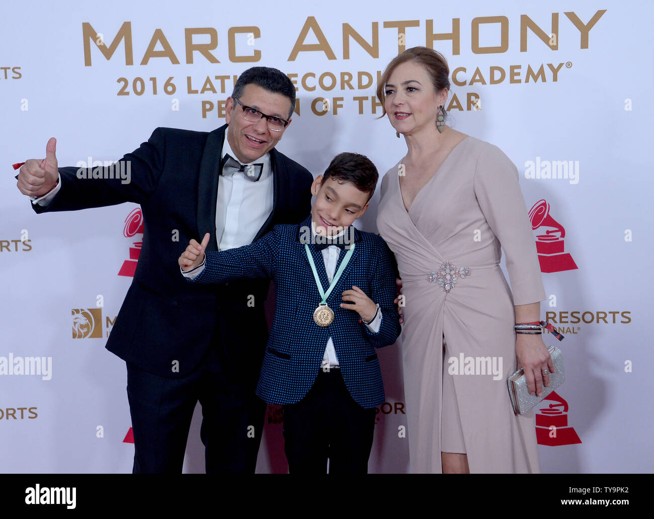 Singer Adrian Martin (C) attend the Latin Grammy Person of the Year ...