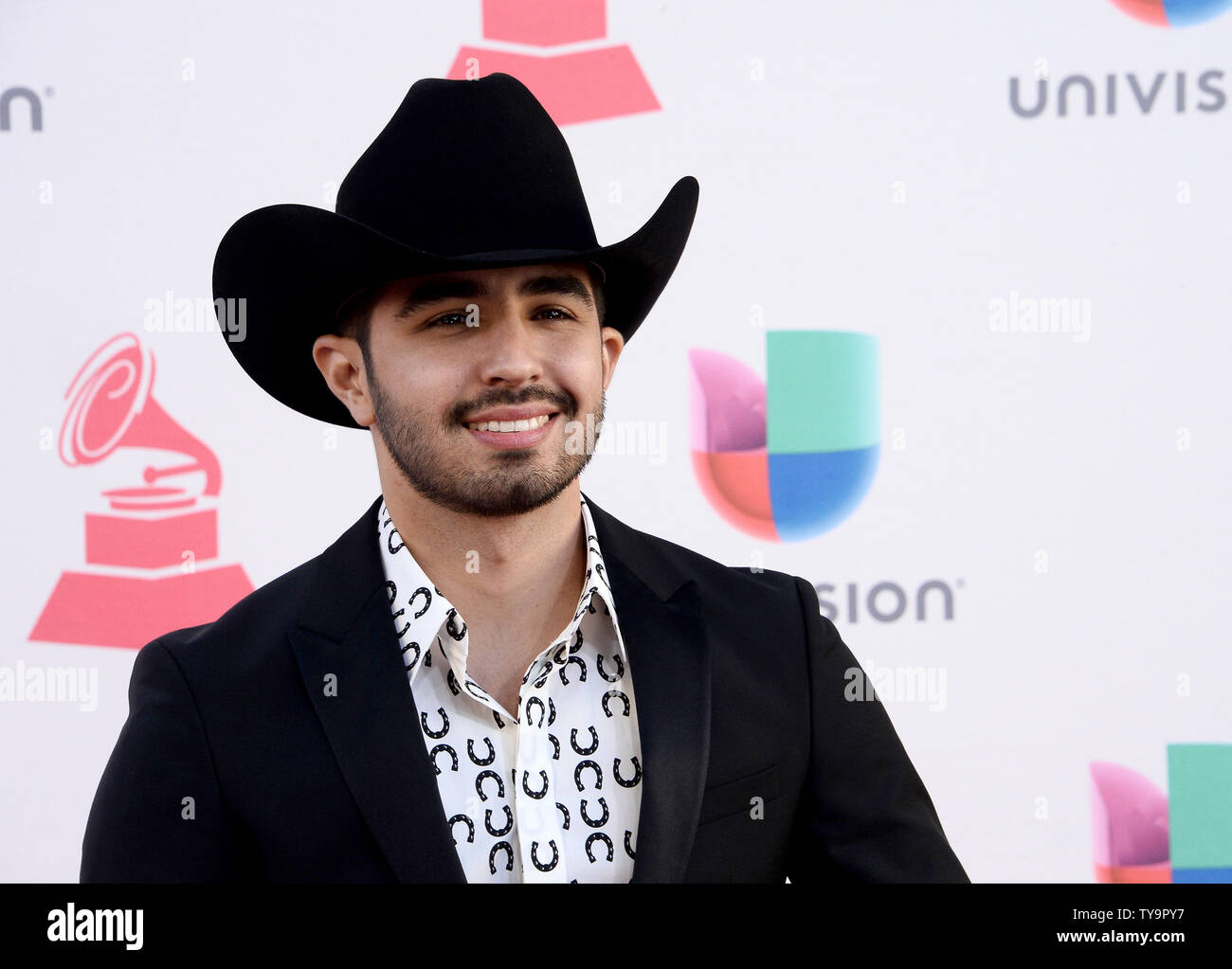 Singer Joss Favela arrives on the red carpet for the 17th annual Latin ...