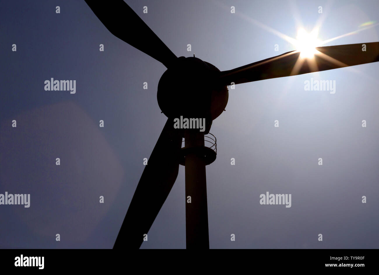 wind turbine with sun rays Stock Photo - Alamy