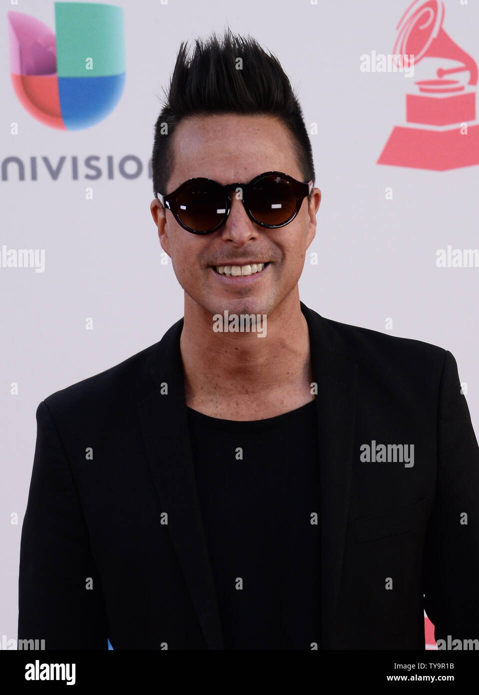 DJ Alex Midi arrives on the red carpet for the 17th annual Latin Grammy ...