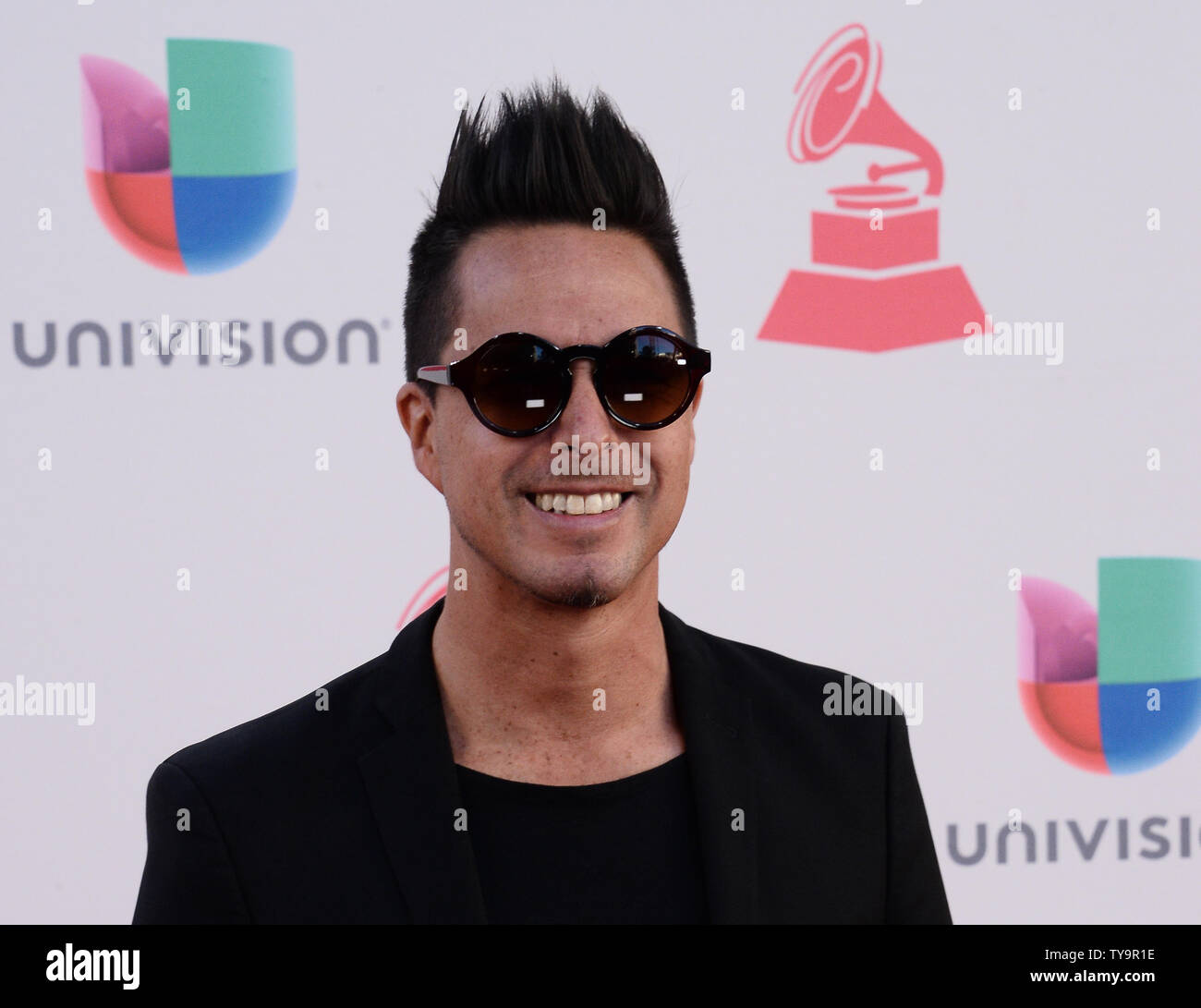 DJ Alex Midi arrives on the red carpet for the 17th annual Latin Grammy ...