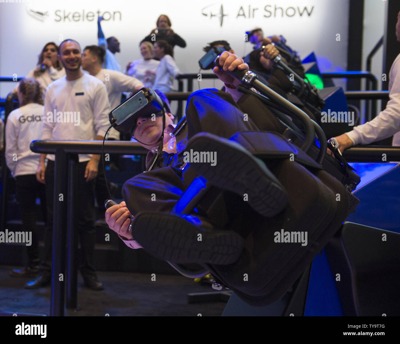A show attendee takes part in the Samsung Gear VR 4D Experience at the ...
