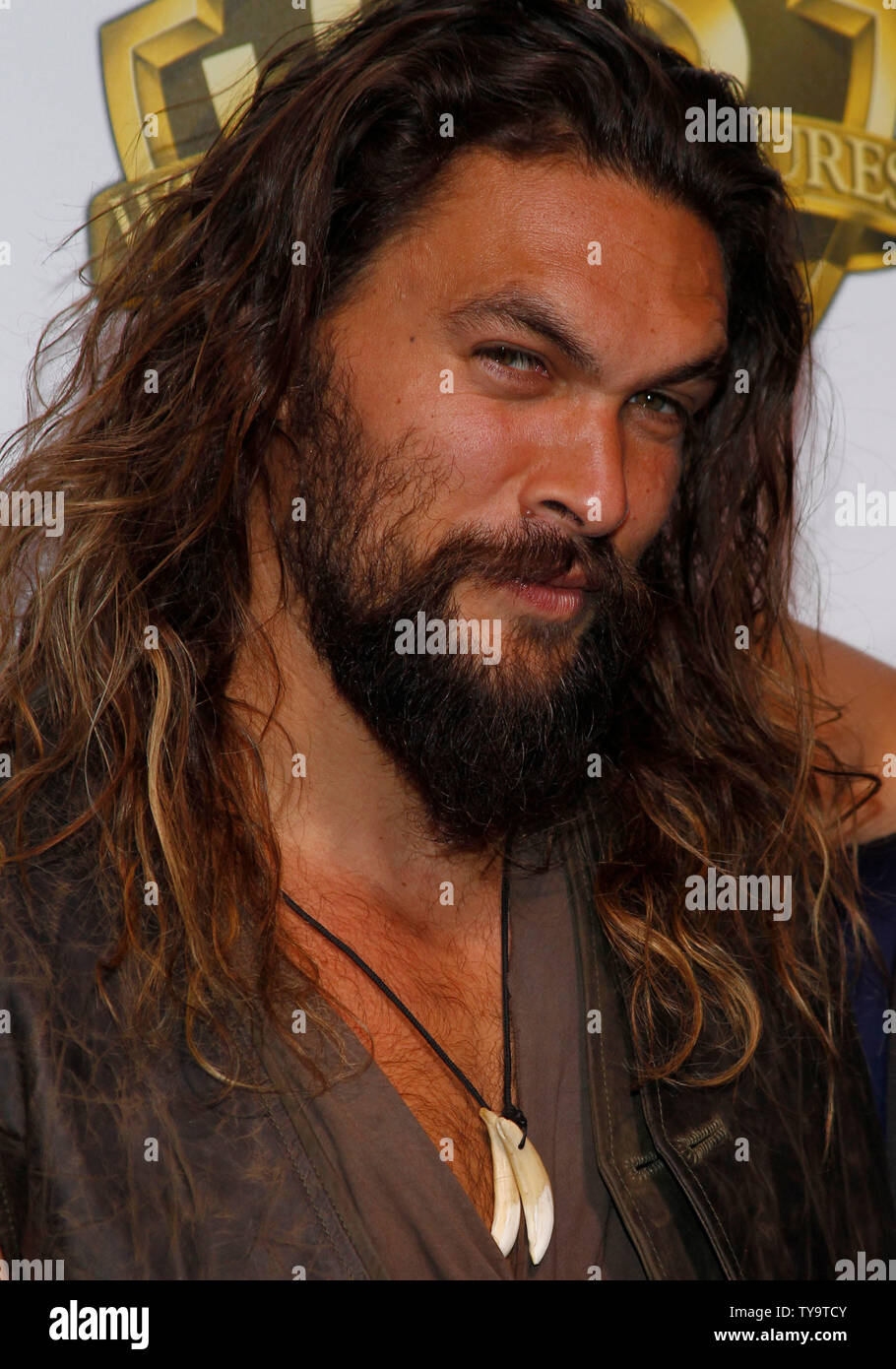Actor Jason Momoa arrives for the Warner Bros. Pictures Invites You to ...