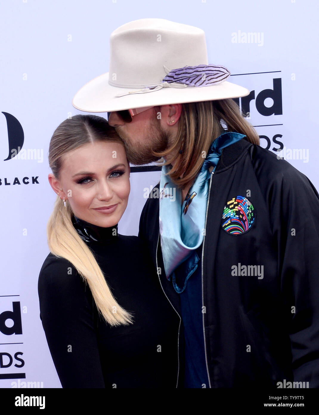 Musician Brian Kelley (R) of Florida Georgia Line and Brittney Cole Kelley attend the annual ...