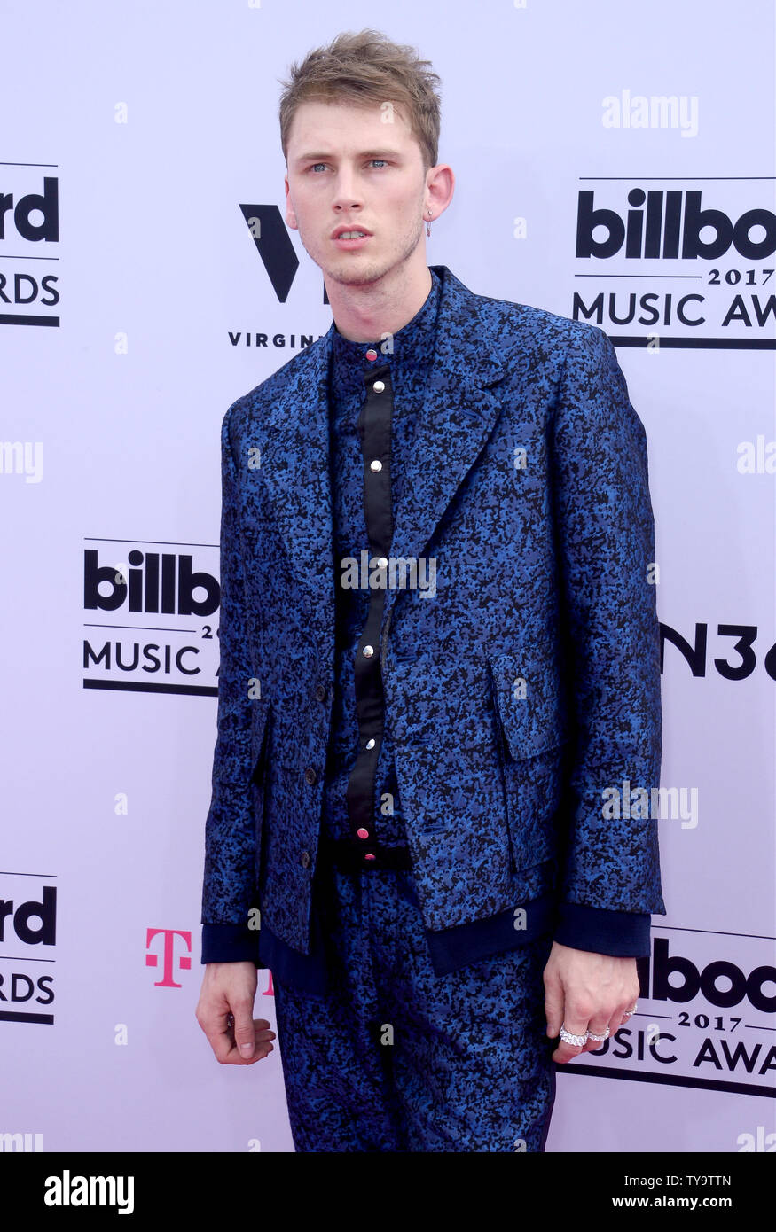 Rapper Machine Gun Kelly attends the annual Billboard Music Awards held ...