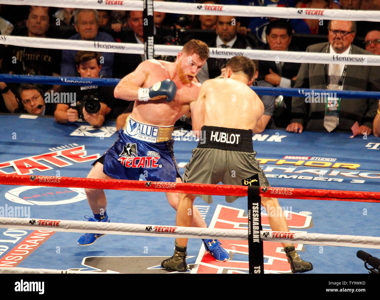 Canelo Alvarez lands a body shot against Gennady Golovkin during the ...