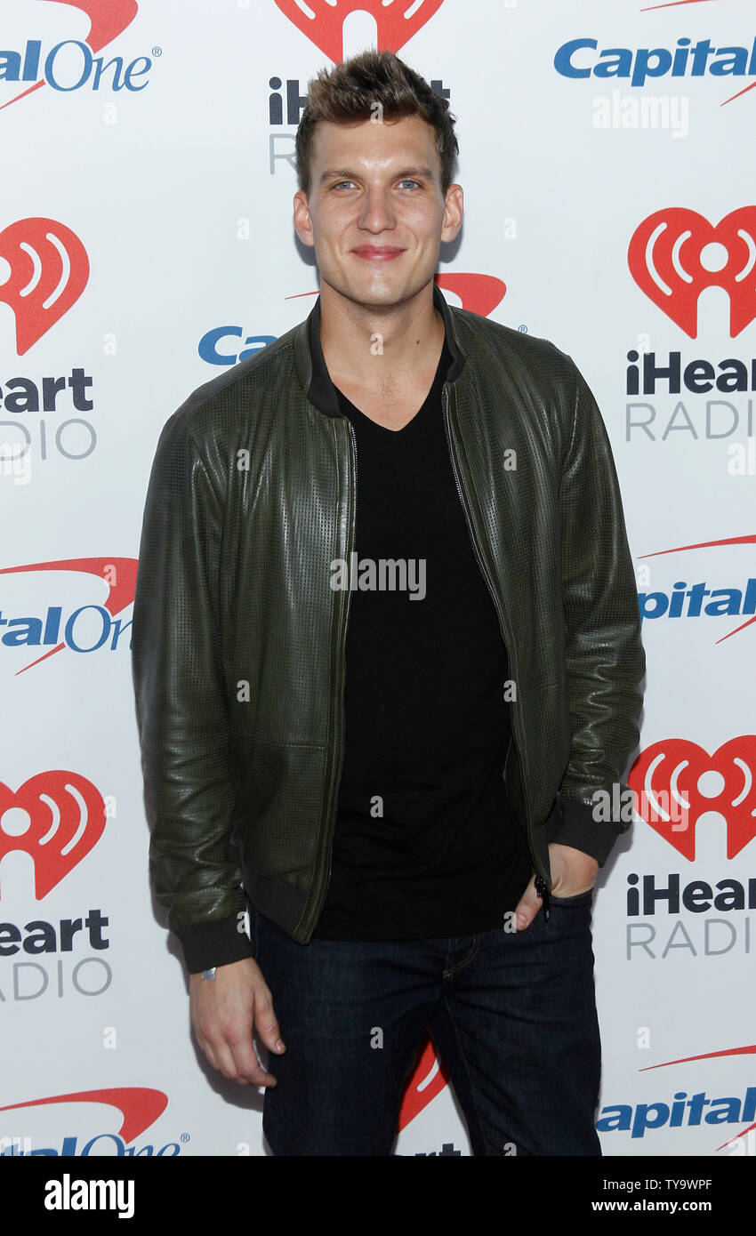 Scott Michael Foster arrive for the iHeartRadio Music Festival at the T ...