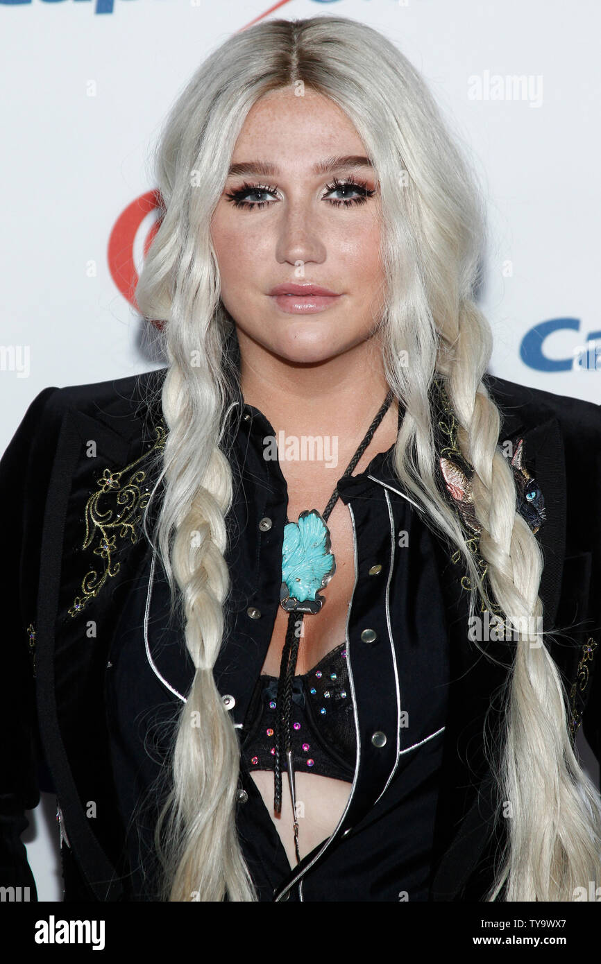 Pop singer Kesha attend the iHeartRadio Music Festival at T-Mobile ...
