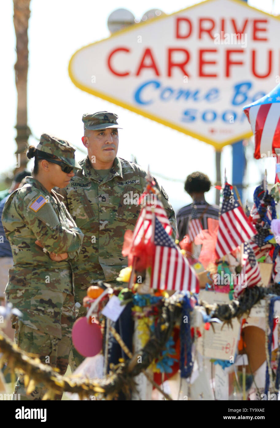 Army National Guard members Staff Sergeant Lisa Insua, left, and ...