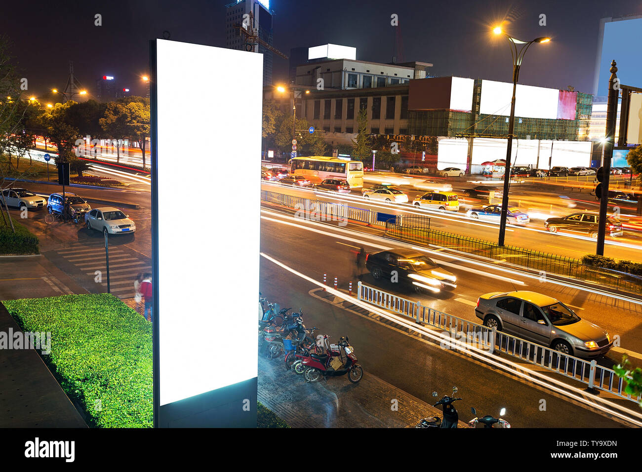 Advertising poster at night city Stock Photo - Alamy
