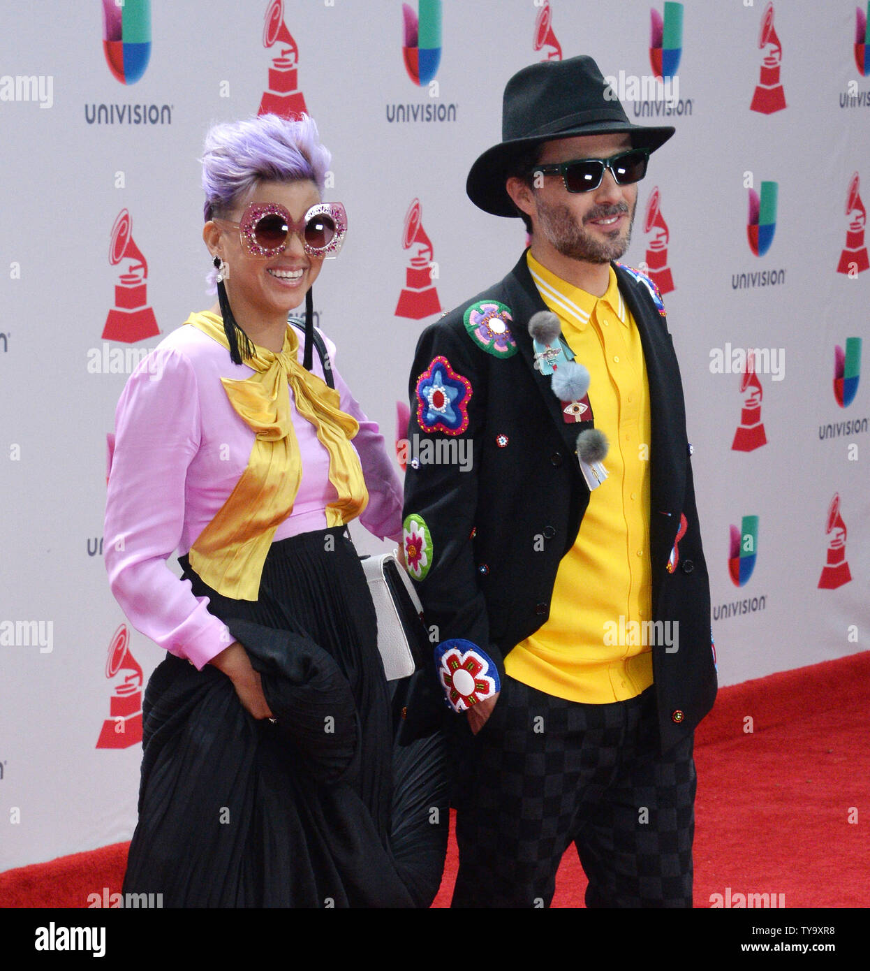 Liliana Saumet (L) and Simon Mejia of Bomba Estereo arrive on the red ...