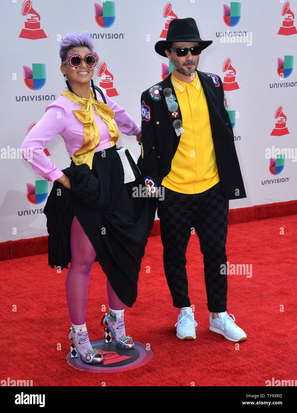Liliana Saumet (L) and Simon Mejia of Bomba Estereo arrive on the red ...