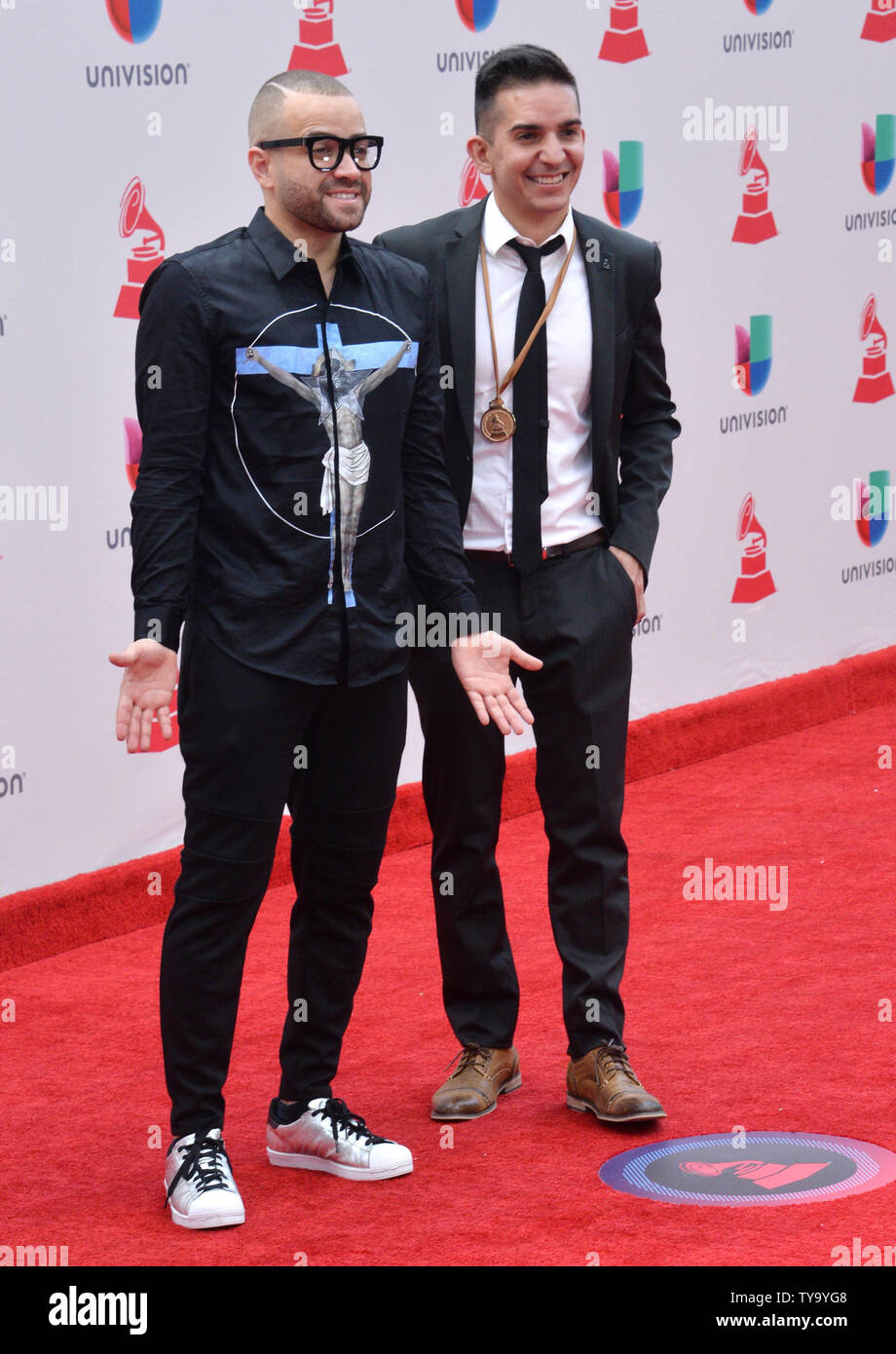 Nacho (L) and Carlos arrive on the red carpet for the 18th annual Latin ...