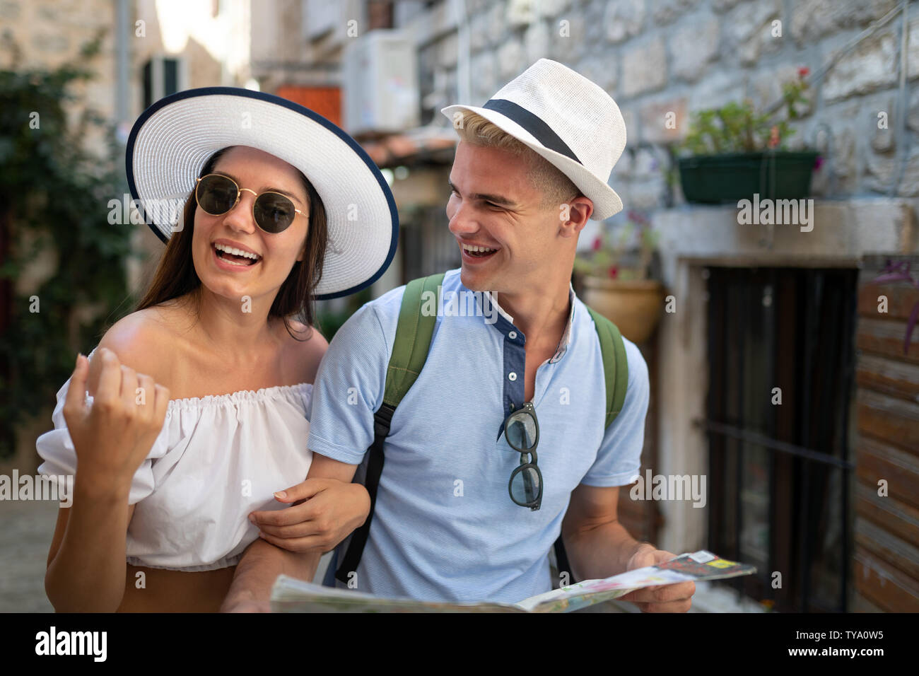 Happy lovely couple enjoying traveling and vacation Stock Photo - Alamy