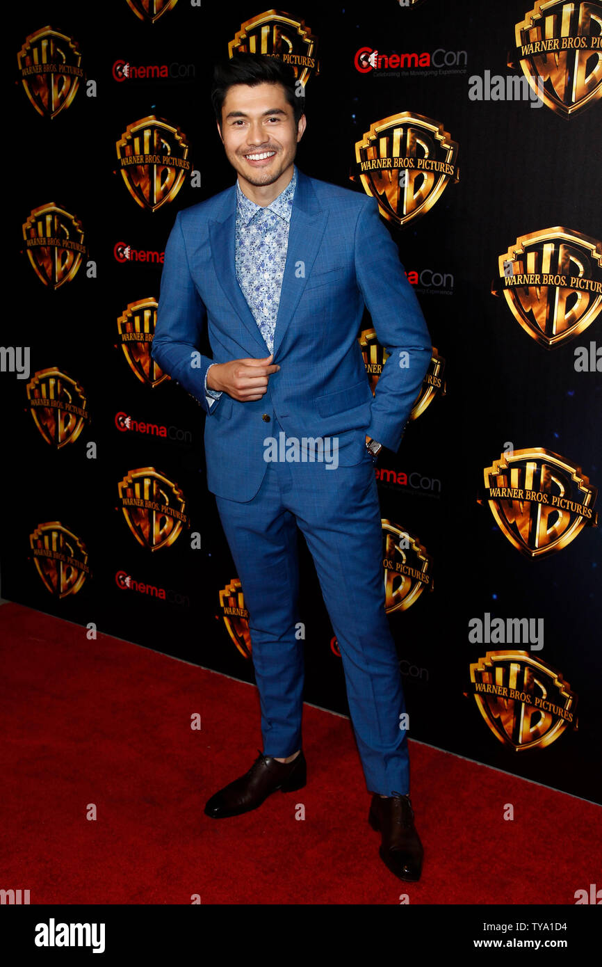 Actor Henry Golding arrives for the CinemaCon 2018 Warner Bros. studio ...