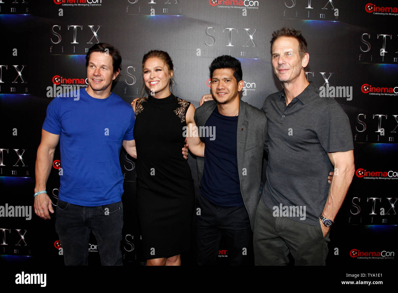 Mark Wahlberg, Rhonda Rousey, Iko Uwais and director Peter Berg arrive ...