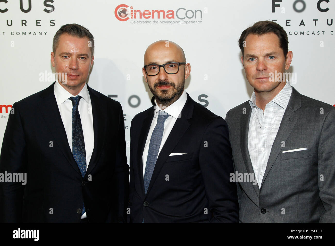 Robert Walak, President of Focus Features, Peter Kujowski, Chairman of ...