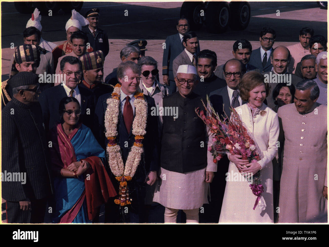Officials of India welcome Jimmy Carter and Rosalynn Carter during an ...