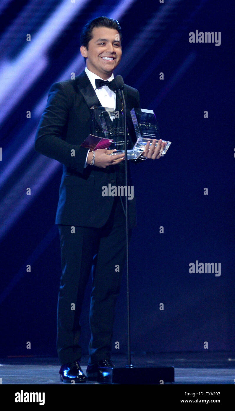 Christian Nodal accepts the award for Regional Mexican Artist of the ...