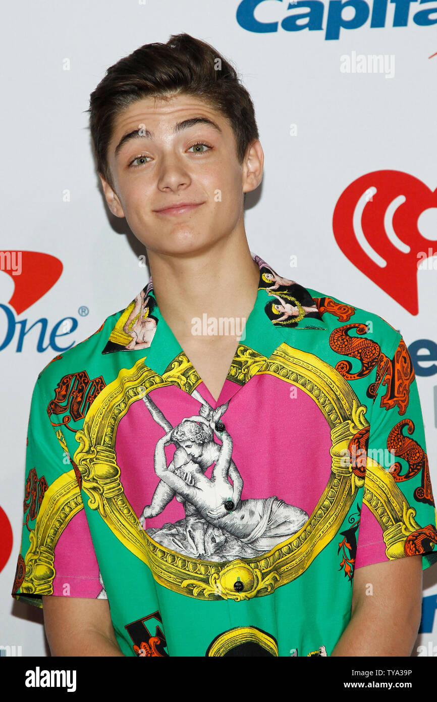 Actor Asher Angel arrives for the iHeartRadio Music Festival at T ...