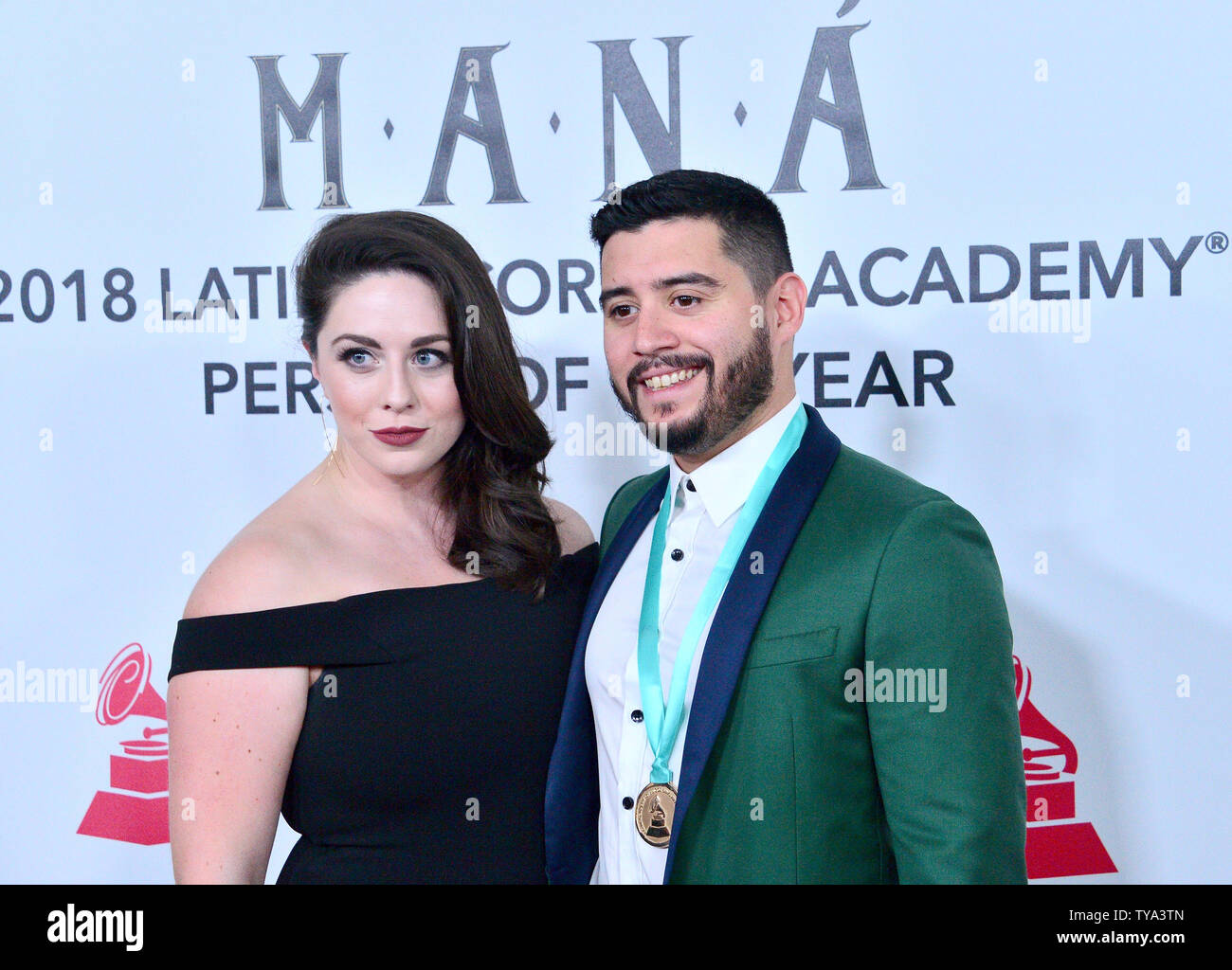 Trooko (R) arrives at the Latin Grammy Person of the Year gala honoring ...