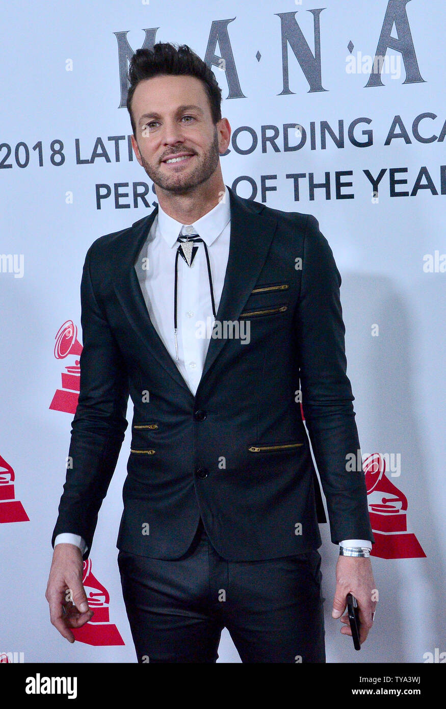 Axel Fernando arrives at the Latin Grammy Person of the Year gala ...