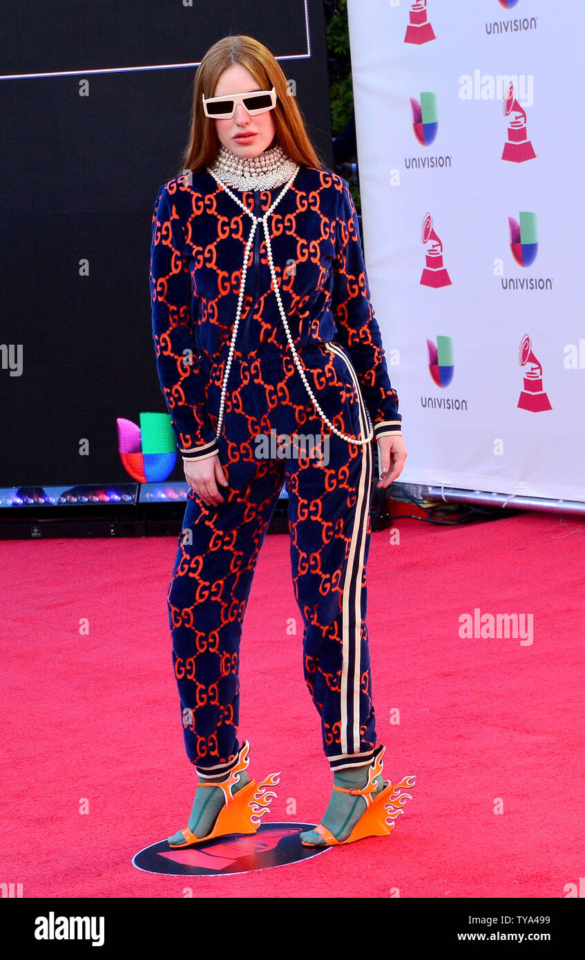Victoria Kuhne arrives on the red carpet for the 19th annual Latin ...
