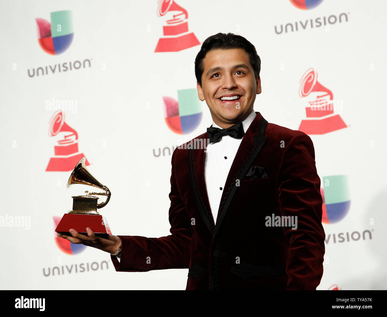 Christian Nodal appears backstage with the award for best regional song ...