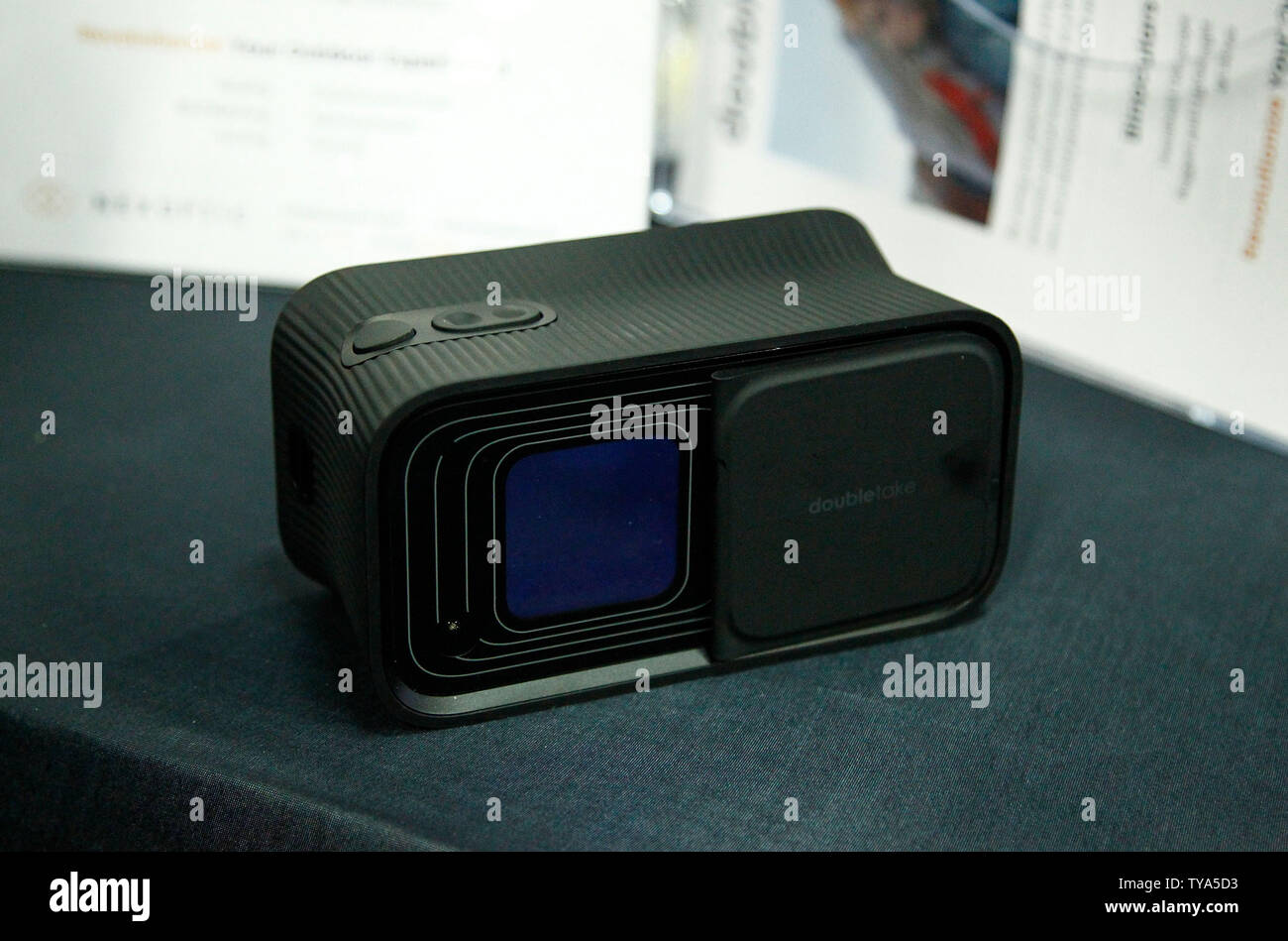 The DoubleTake digital binoculars by NexOptic on display during the ...