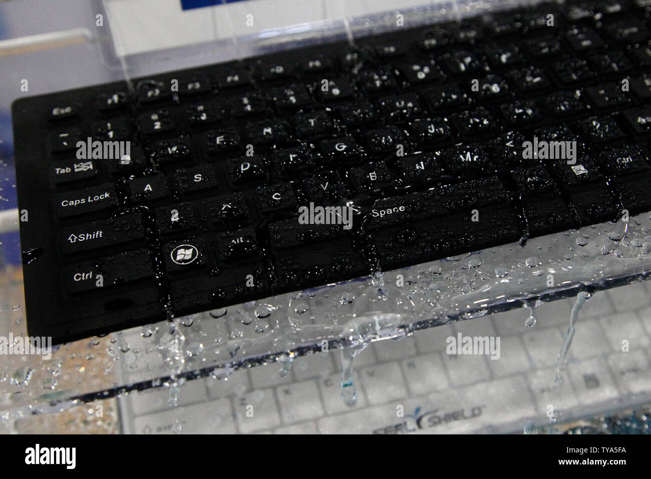 Water spill keyboard hi-res stock photography and images - Alamy