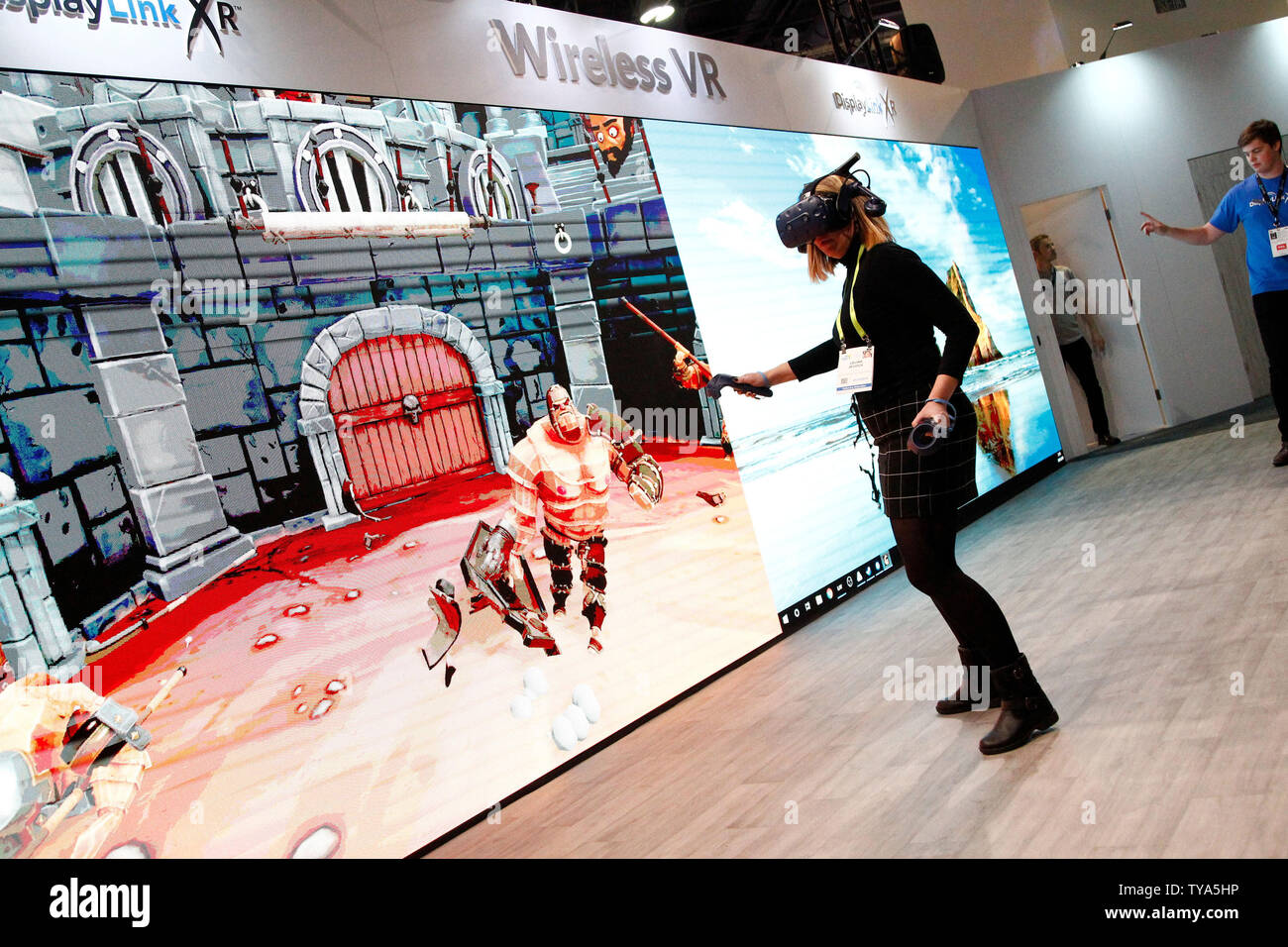 An attendee trys out the DisplayLink XR wireless VR stepup at the 2019 ...