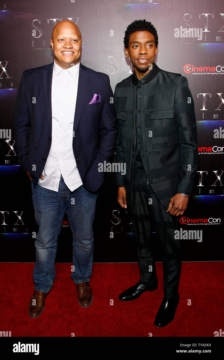 Producer Logan Coles and actor Chadwick Boseman from '21 Bridges ...