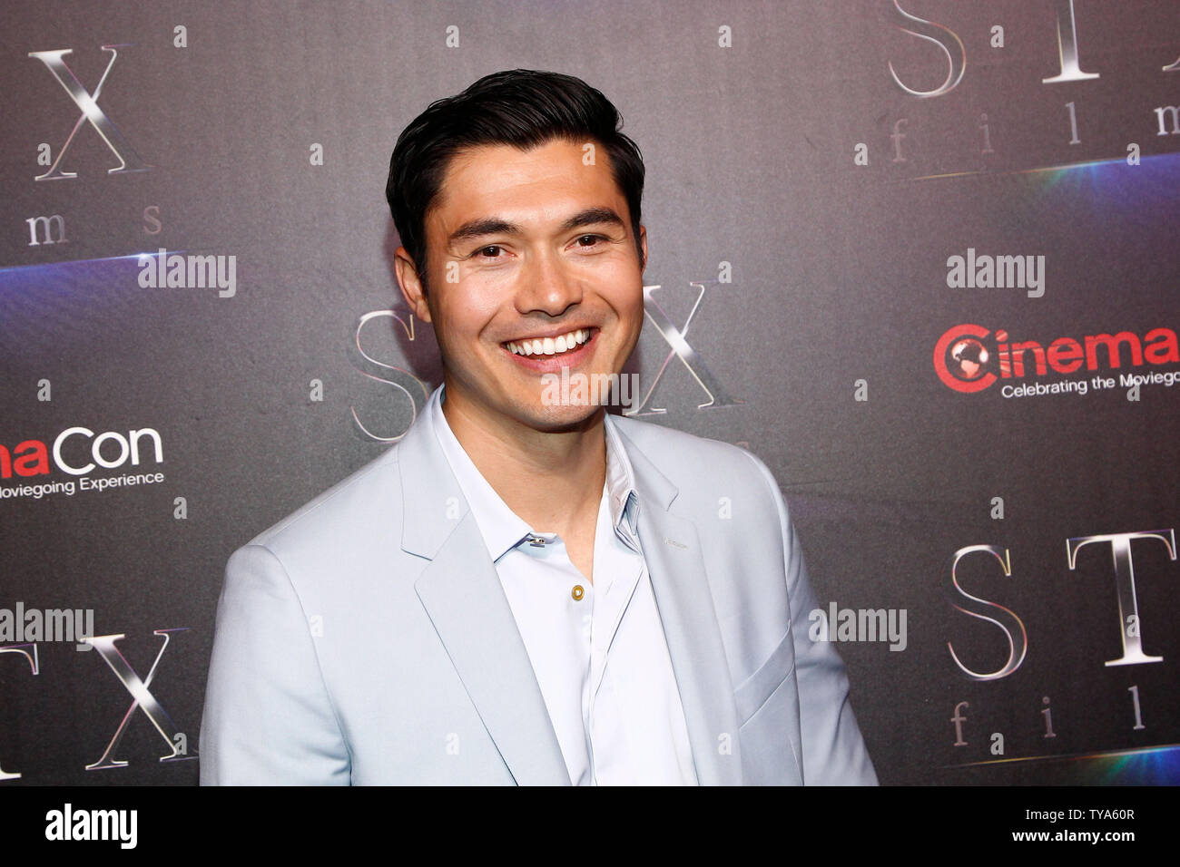 Actor Henry Golding arrives for the CinemaCon 2019 STXfilms red carpet ...