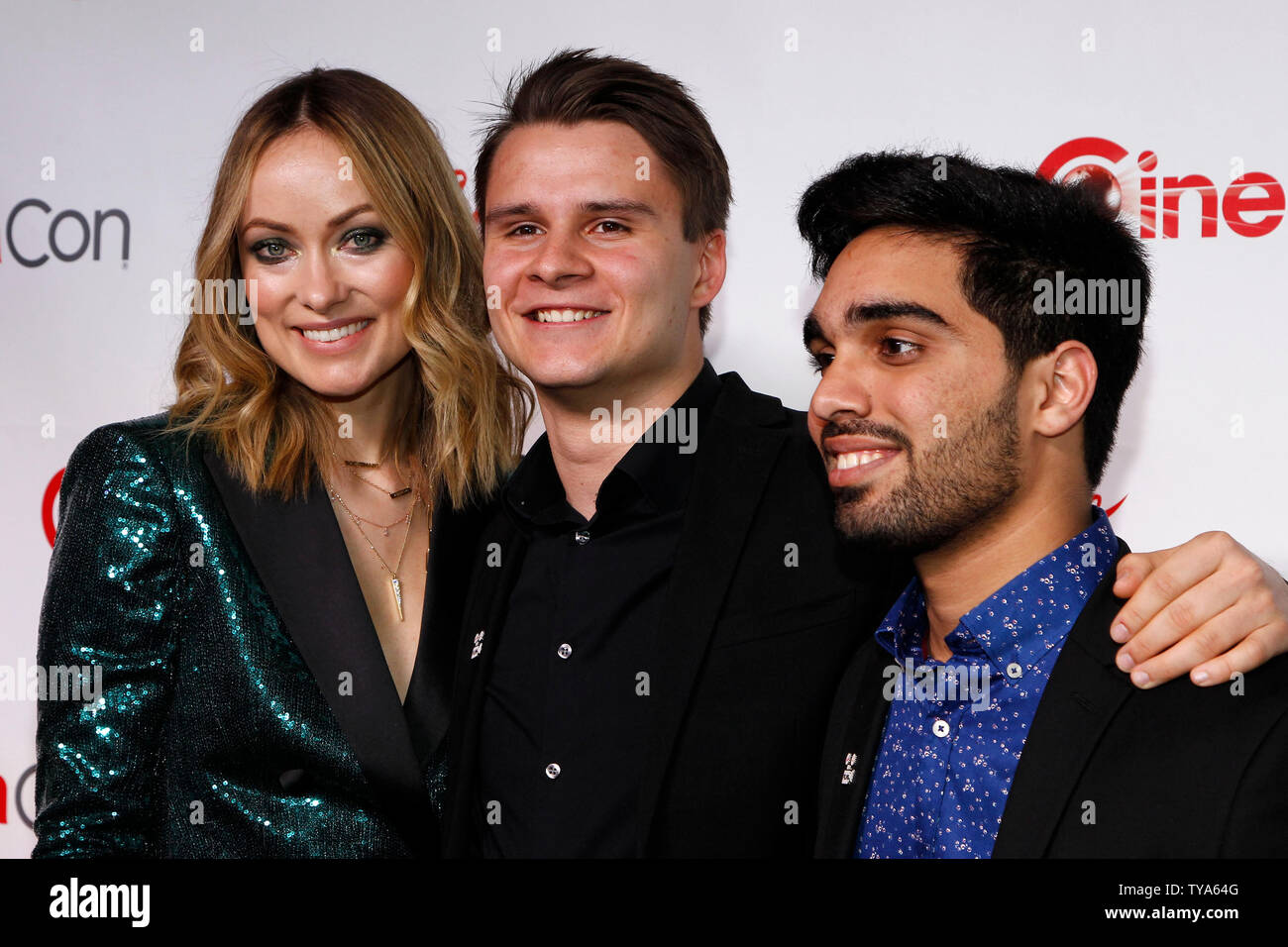 Actress Olivia Wilde (L) with Coca-Cola Regal Films Winners Devon ...