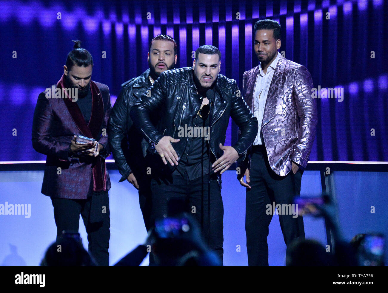 (L-R) Lenny Santos, Henry Santos, Max Santos and Romeo Santos, of ...