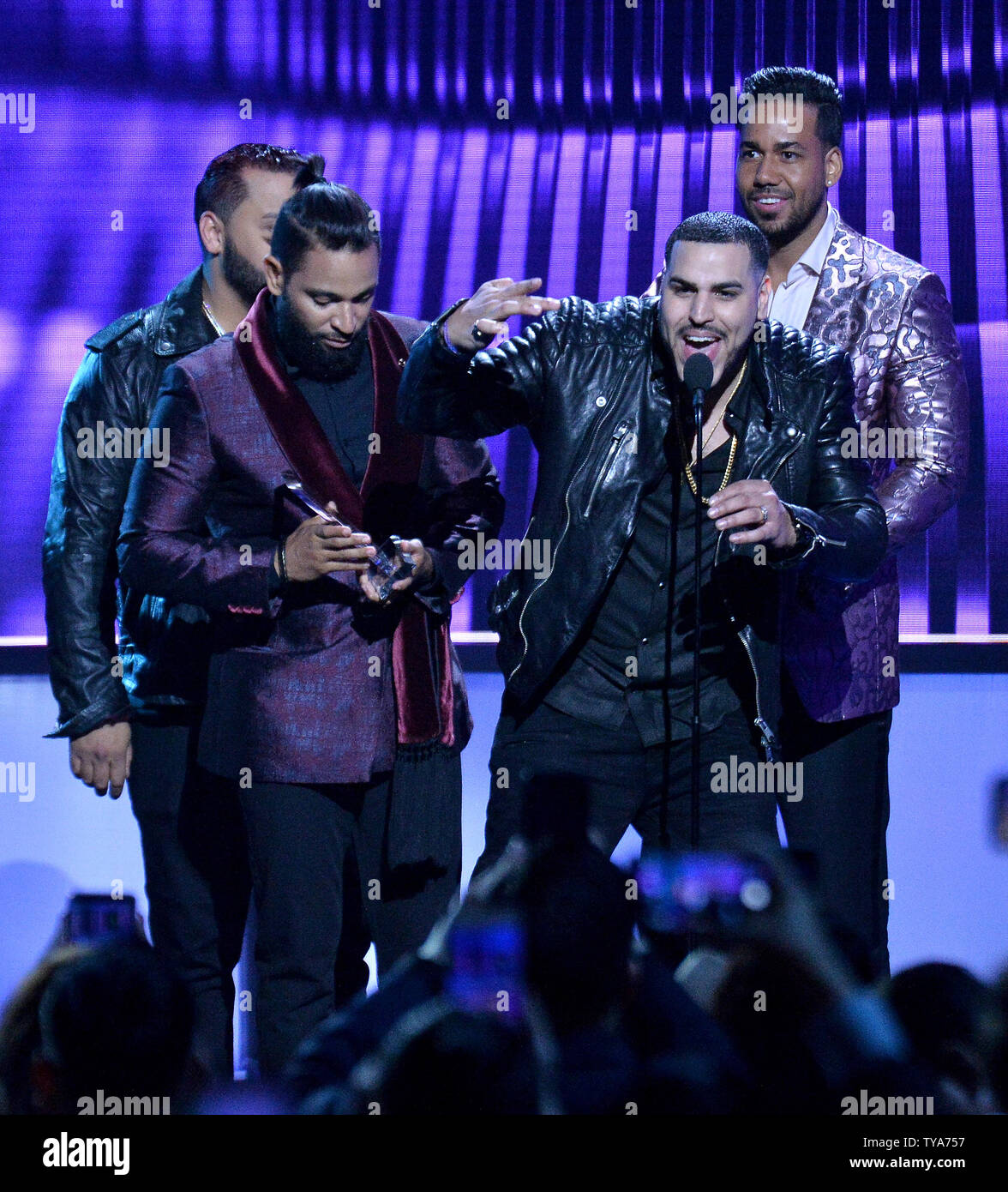 (L-R) Lenny Santos, Henry Santos, Max Santos and Romeo Santos, of ...