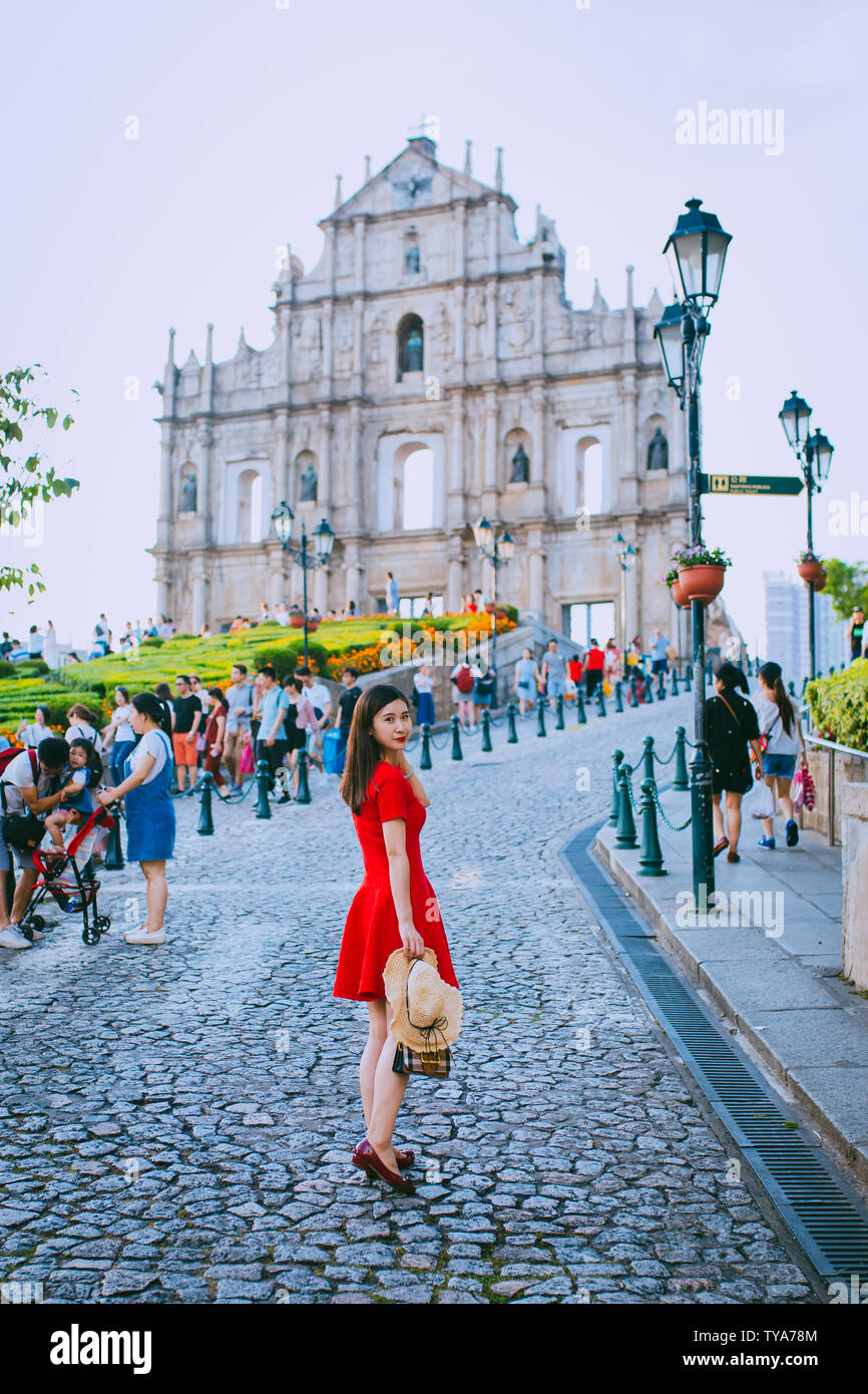 Red dress to Macau Stock Photo - Alamy