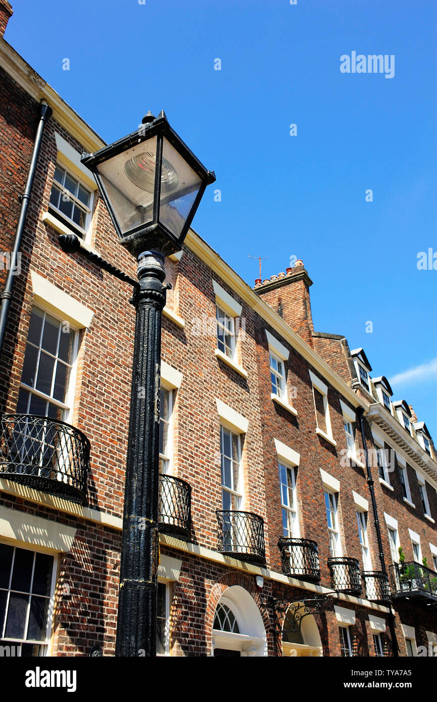 Old style lamp post in front of the elegant Georgian terrace row of ...