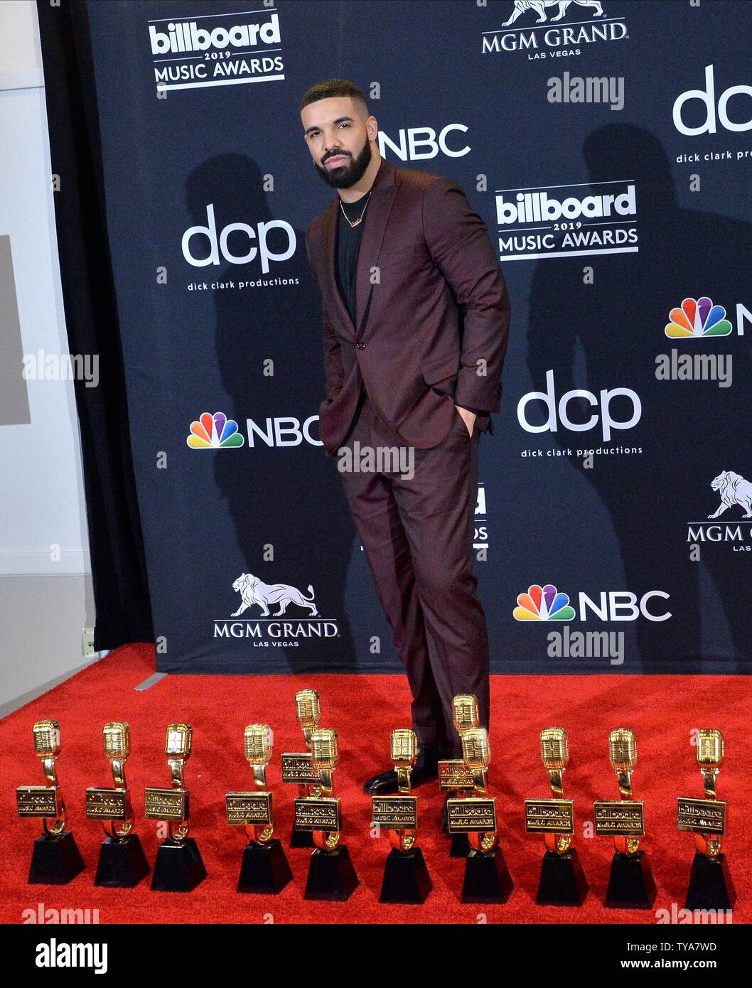 Drake appears backstage after winning the awards for Top Artist, Top ...