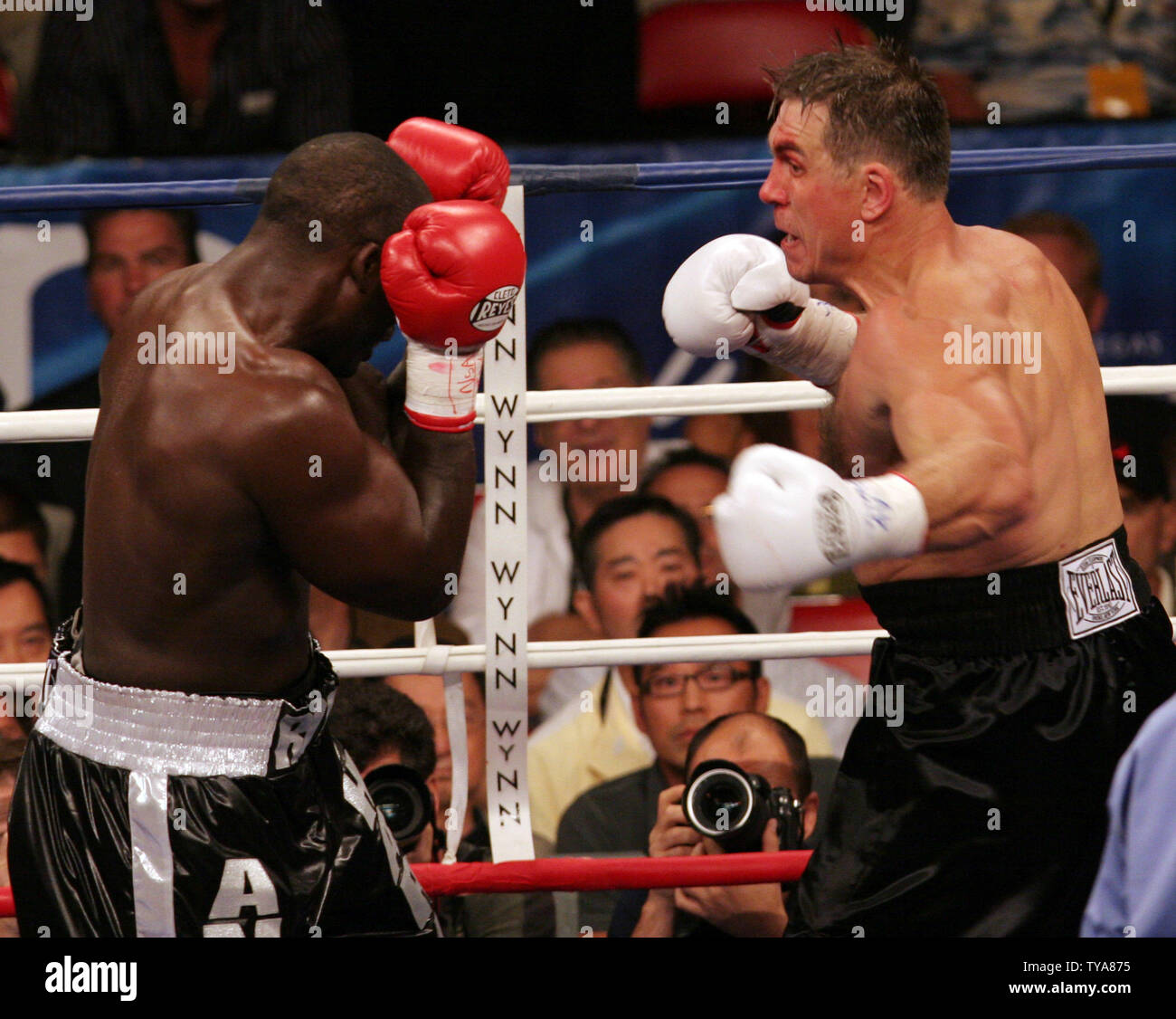Oleg Maskaev of Kazakhstan (R) prepares to hit American Hasim Rahman ...